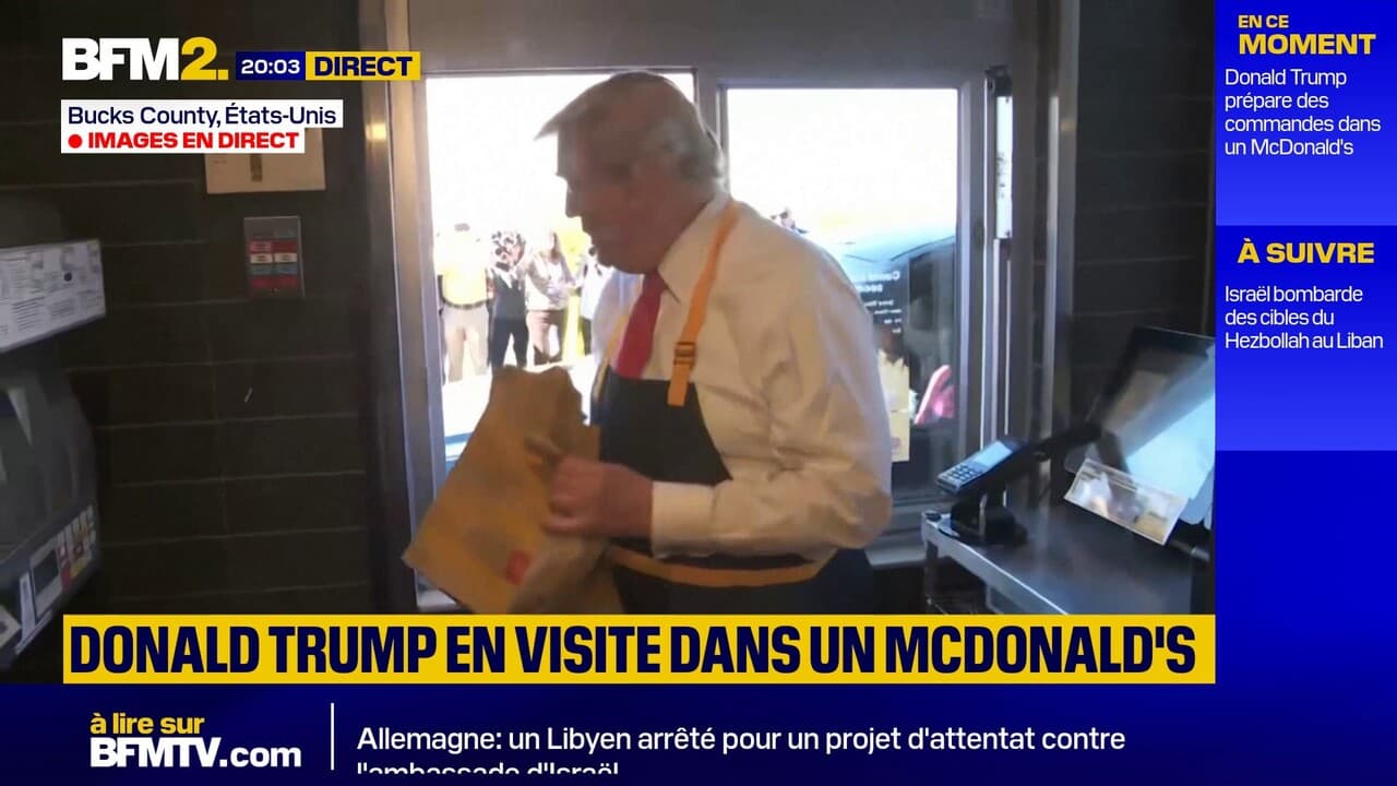Donald Trump distribue les commandes aux clients dans un McDonald's