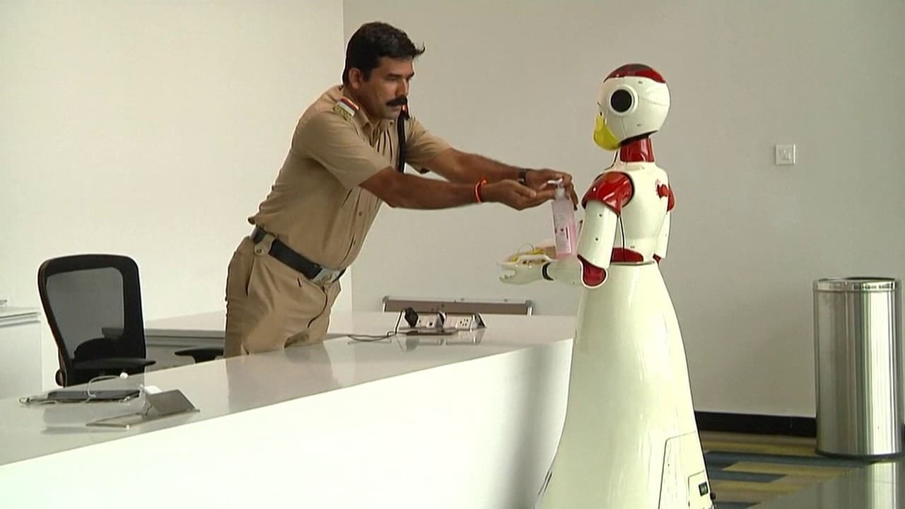 En Inde, des robots distribuent des masques et des gels ...