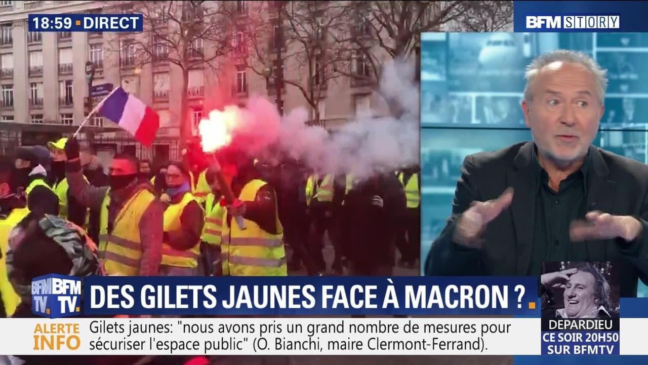 Des gilets jaunes face à Emmanuel Macron
