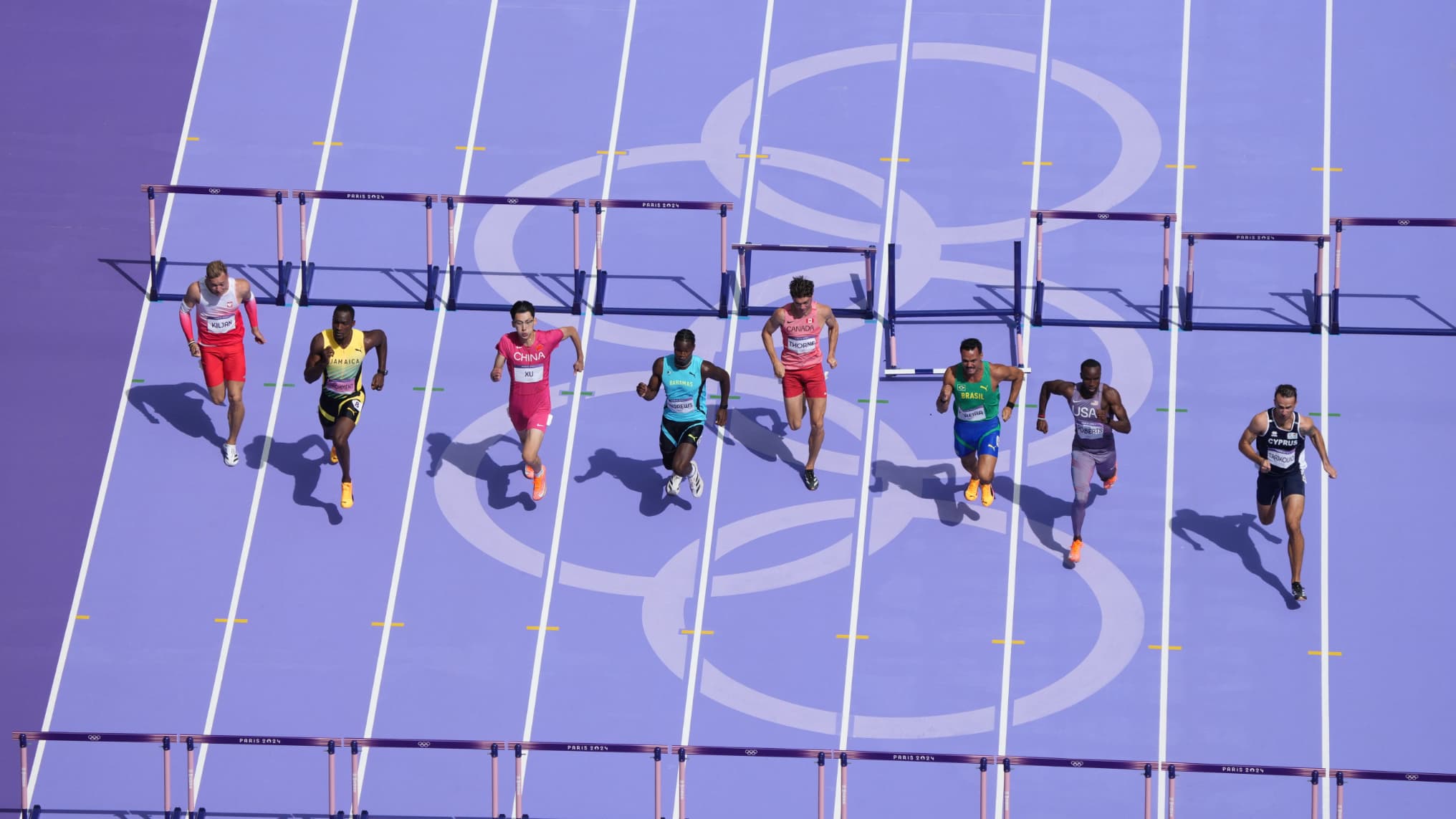 JO 2024 (athlétisme): la piste violette du Stade de France fait un ...